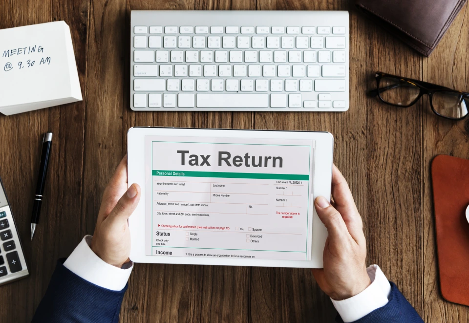 Income tax return filing on tablet | Shah & Doshi Chartered Accountants
